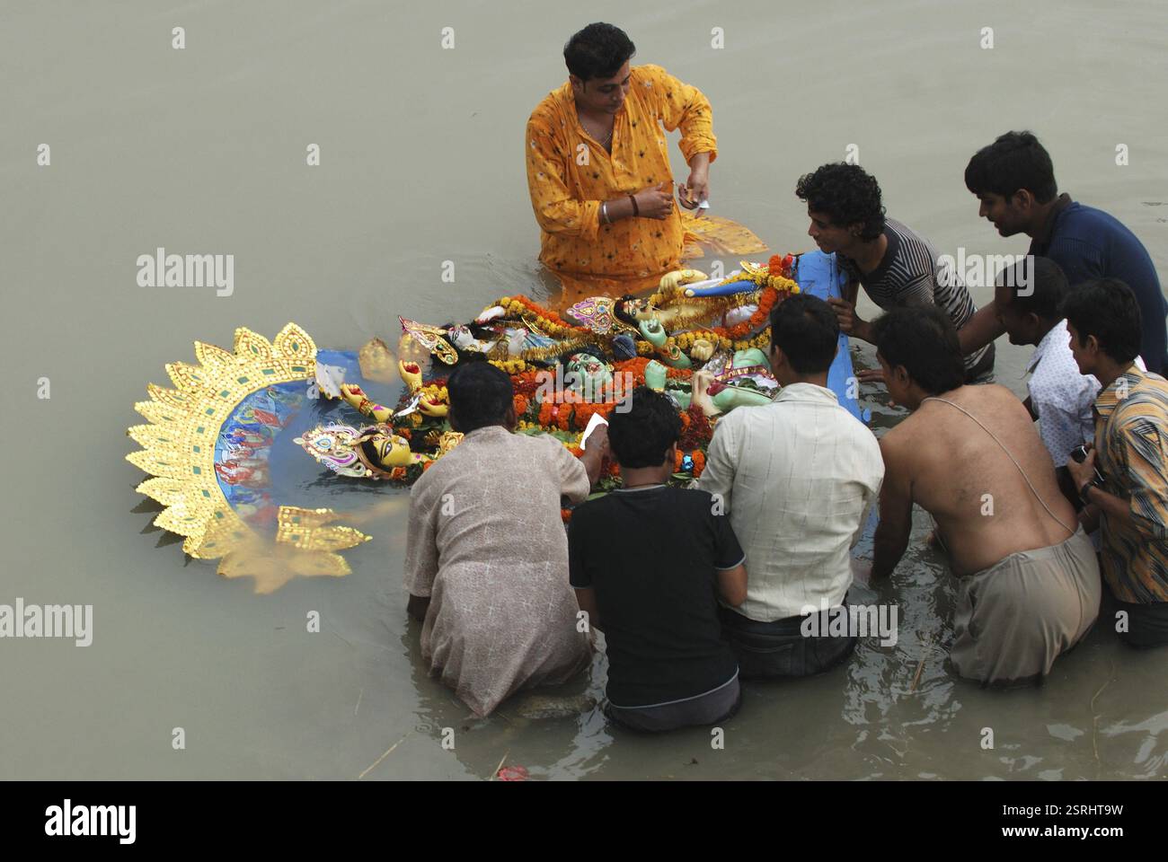 Durga Puja, ceremonial immersion of goddess in river Ganga, Howrah ...