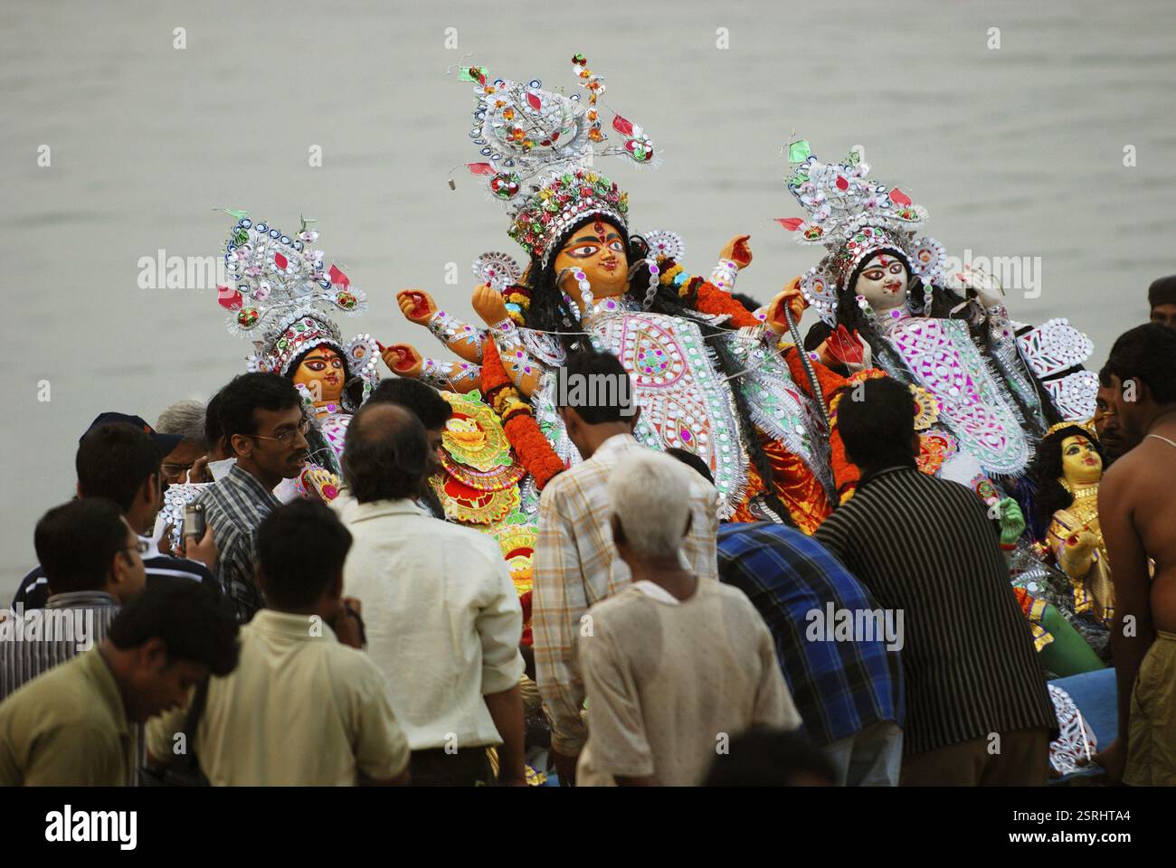 Durga Puja, ceremonial immersion of goddess in river Ganga, Howrah ...