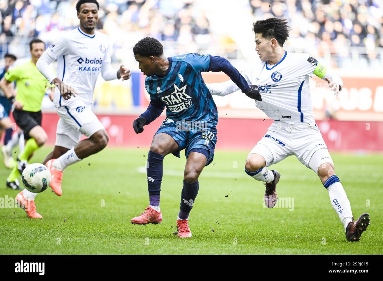 Gent, Belgium. 16th Feb, 2025. Beerschot's Daishawn Redan and Gent's Tsuyoshi Watanabe pictured ...