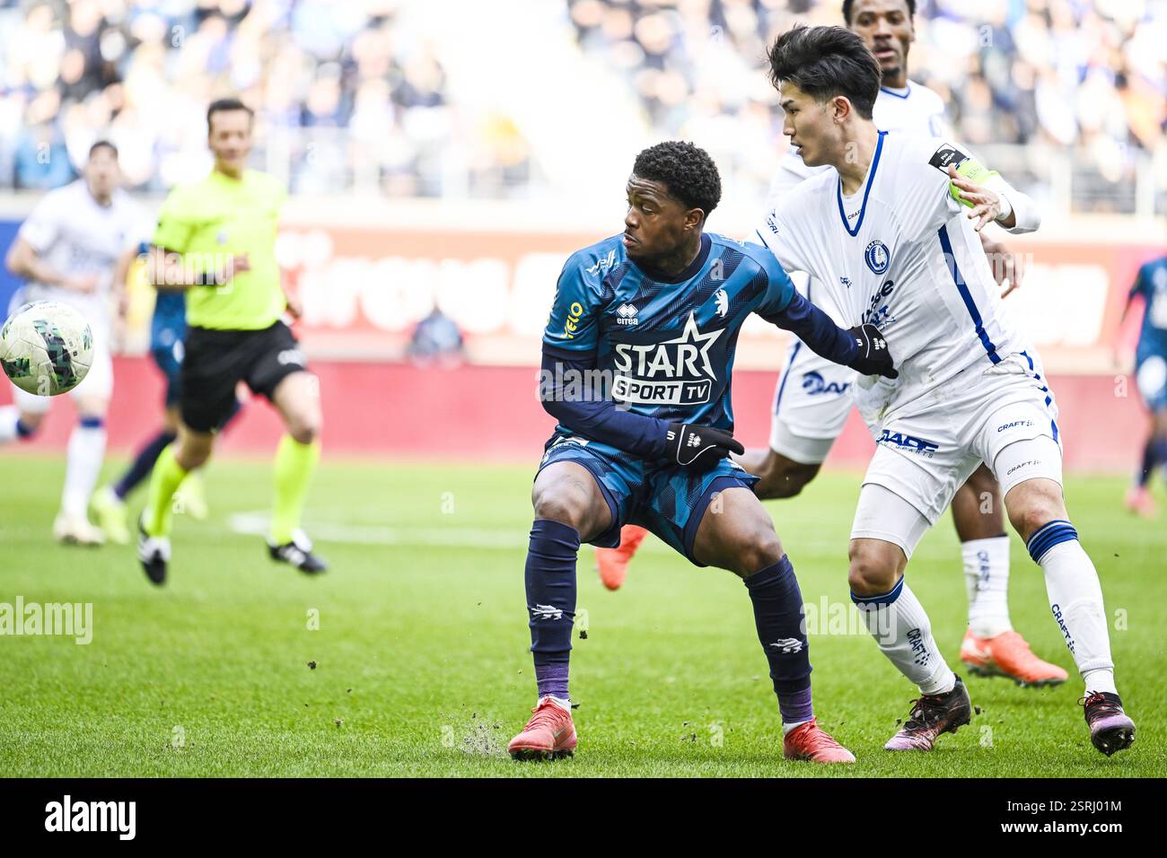 Gent, Belgium. 16th Feb, 2025. Beerschot's Daishawn Redan and Gent's Tsuyoshi Watanabe pictured ...
