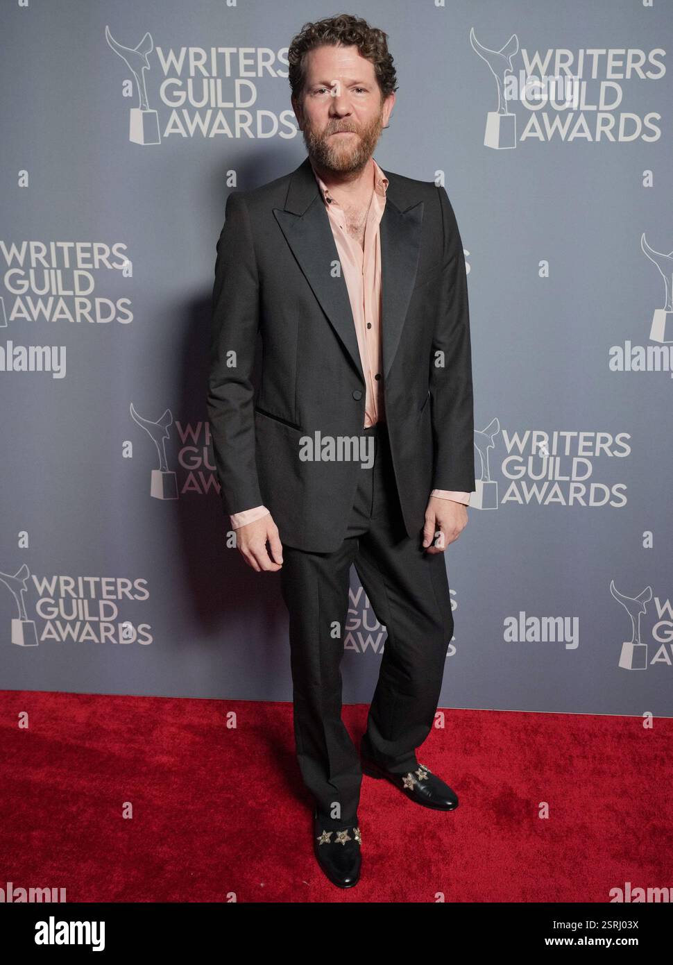 Joshua Zetumer arrives at the 2025 Writers Guild Awards held at the ...