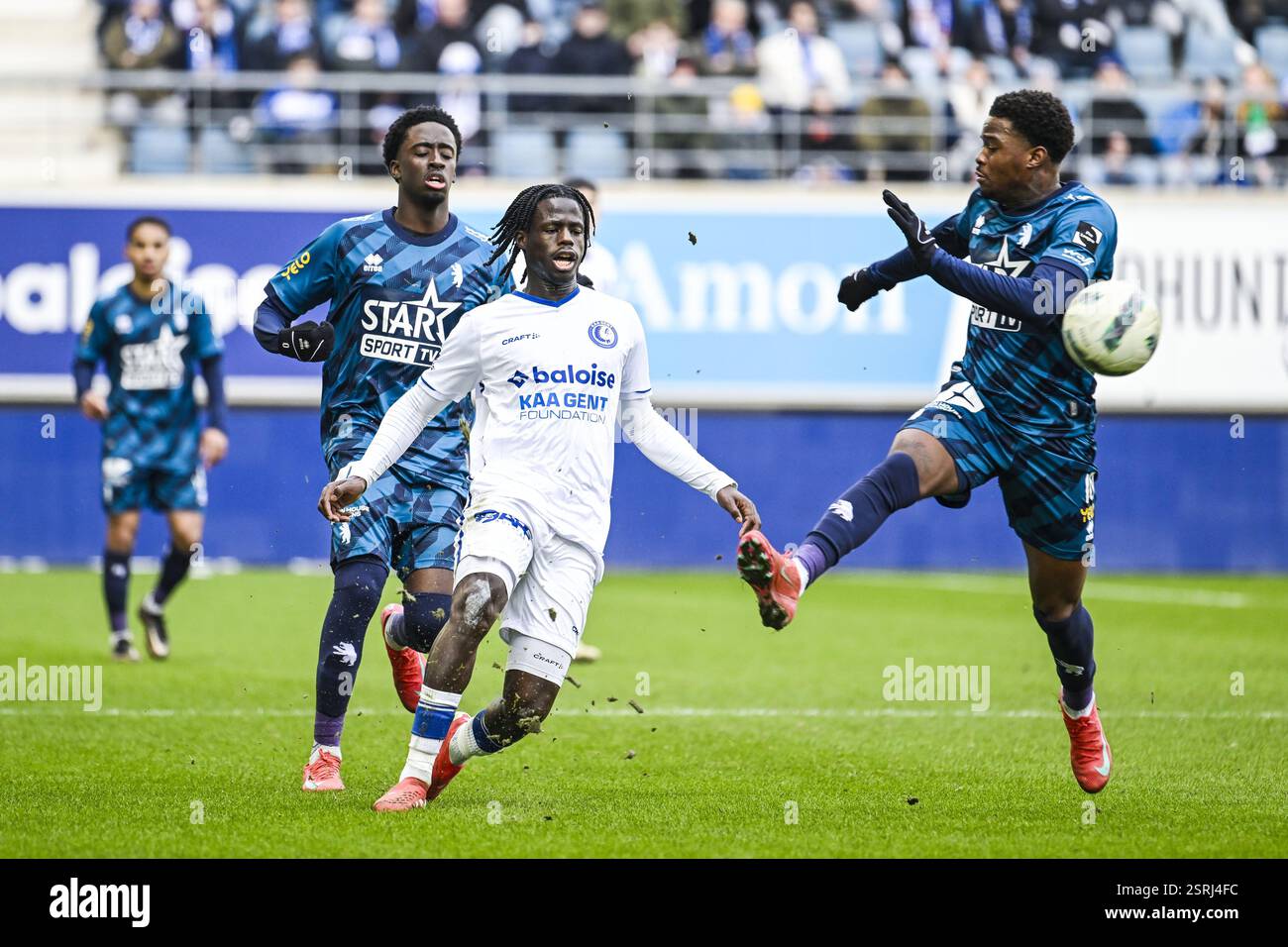 Gent, Belgium. 16th Feb, 2025. Beerschot's Hakim Sahabo, Gent's Leonardo Da Silva Lopes and ...