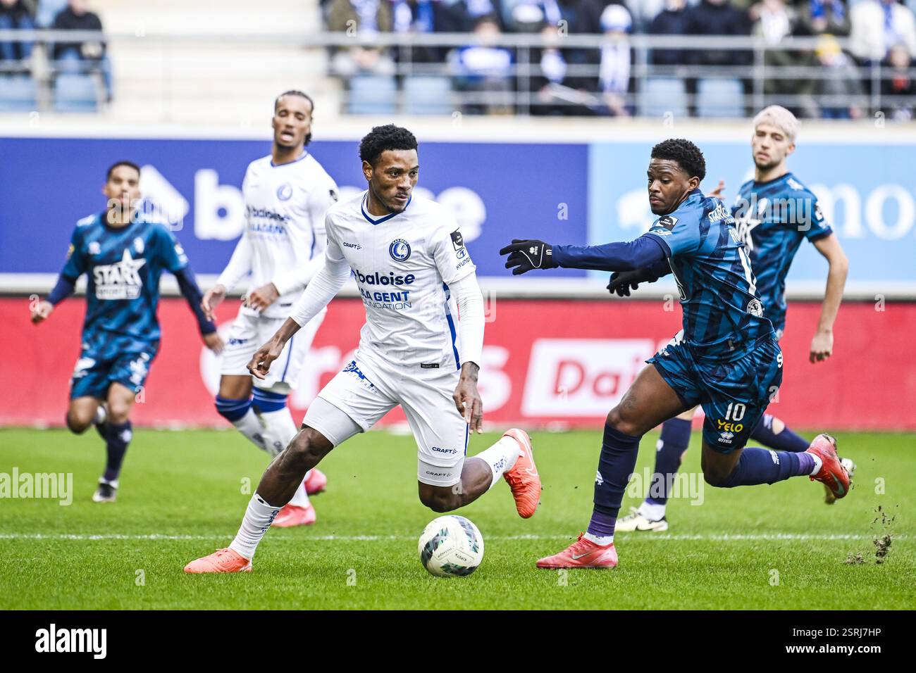 Gent, Belgium. 16th Feb, 2025. Gent's Samuel Kotto and Beerschot's ...