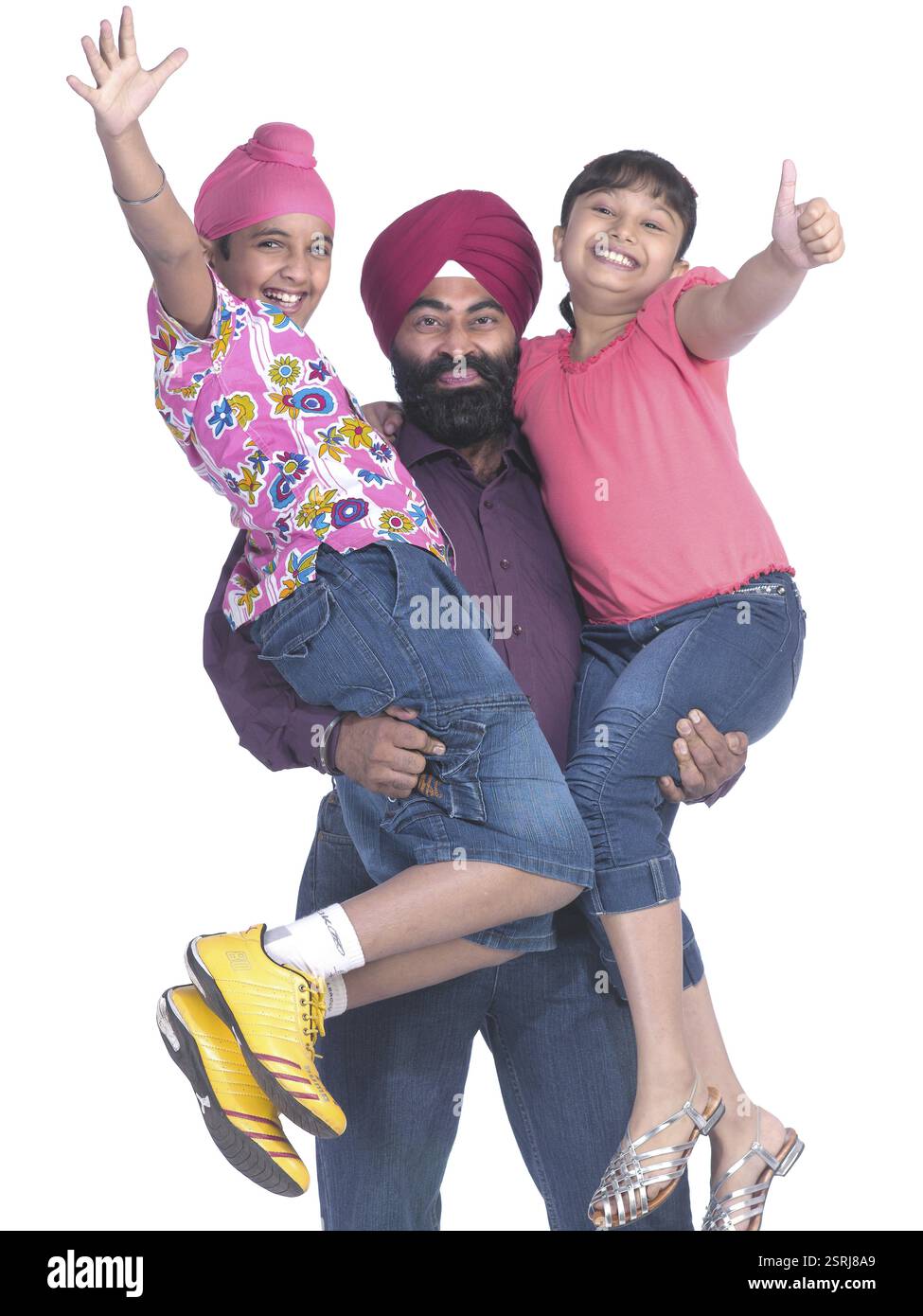 Sikh father carrying children in arms MR#702X, 702Y, 779A Stock Photo ...