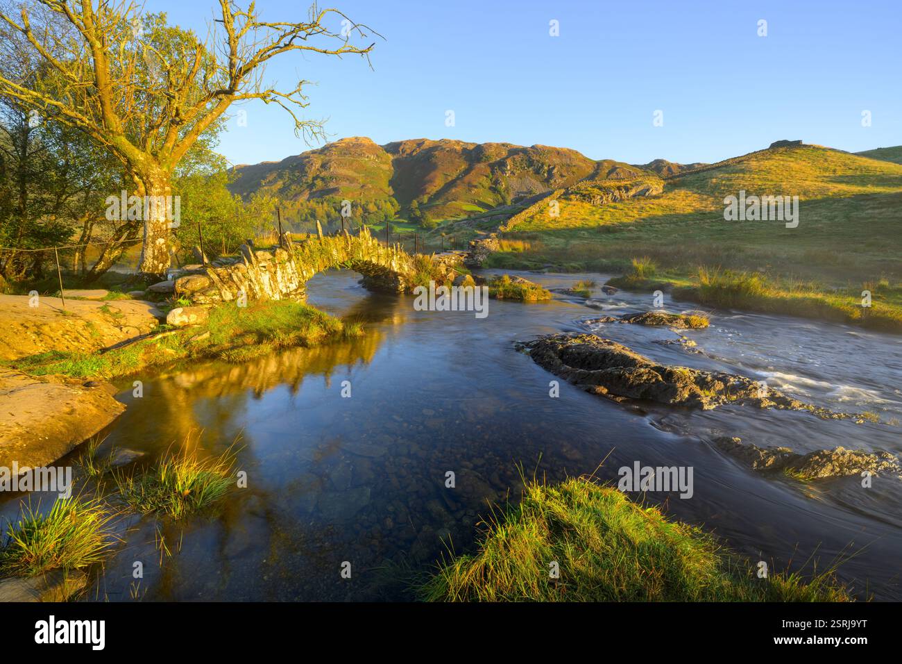 Slaters Bridge in Little Langdale on a summer morning by the river ...