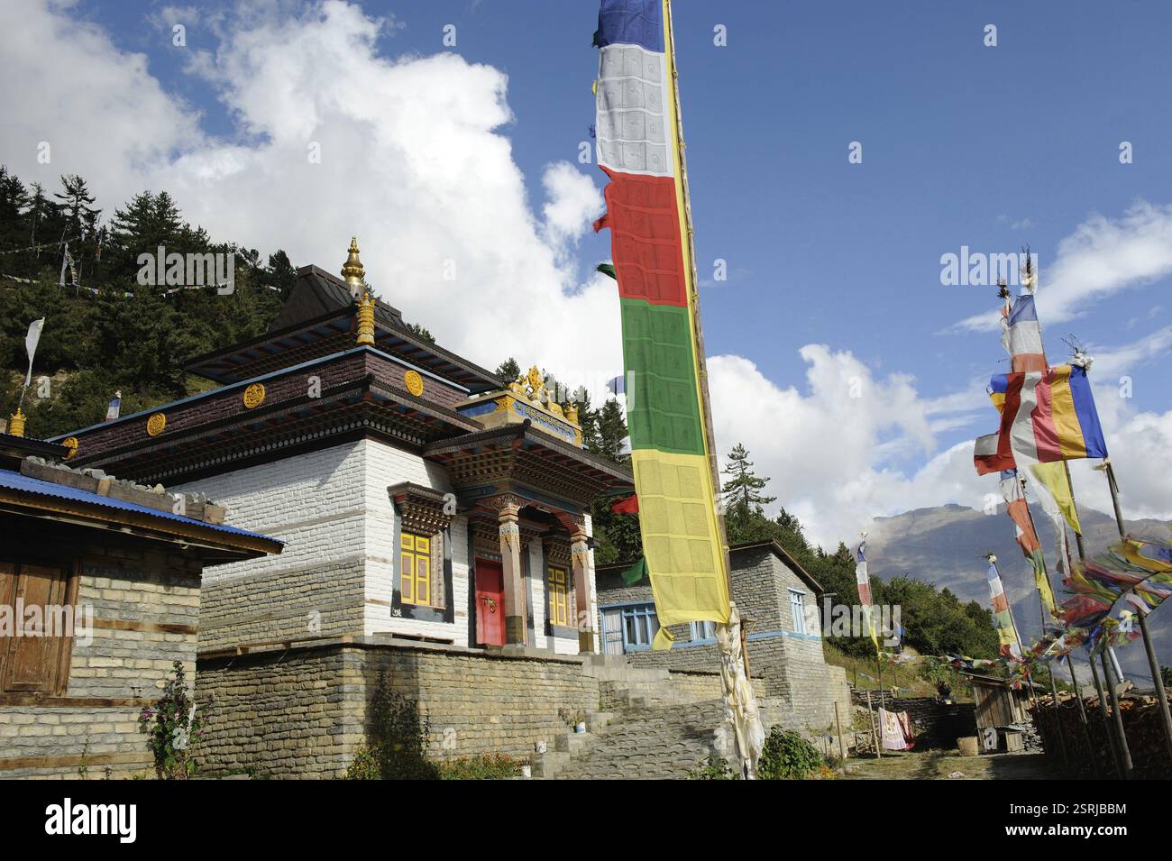 Holy flags at monastery, Upper Pisang, Nepal, Asia Stock Photo - Alamy