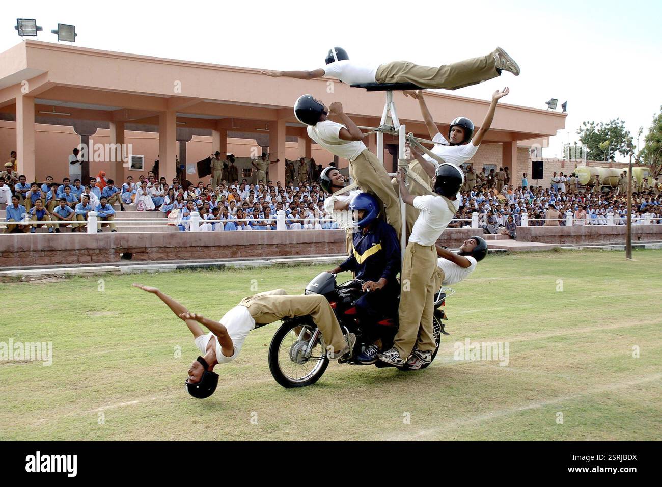 Policeman showing tricks on motorbikes, Jodhpur, Rajasthan, India, Asia ...