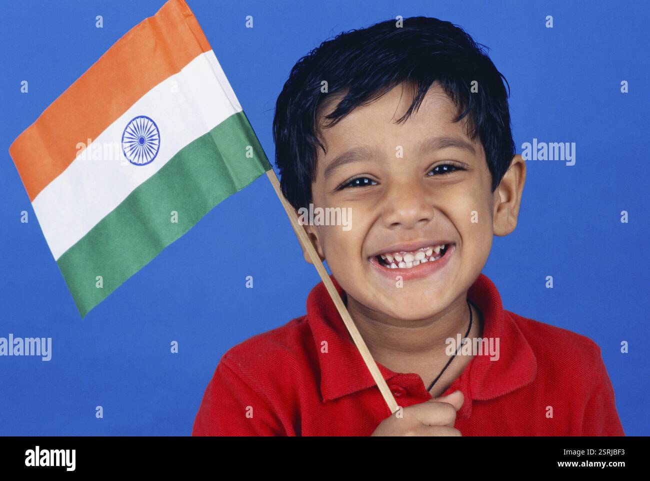 Indian boy holding flag of India on Independence Day, India, Asia Stock ...