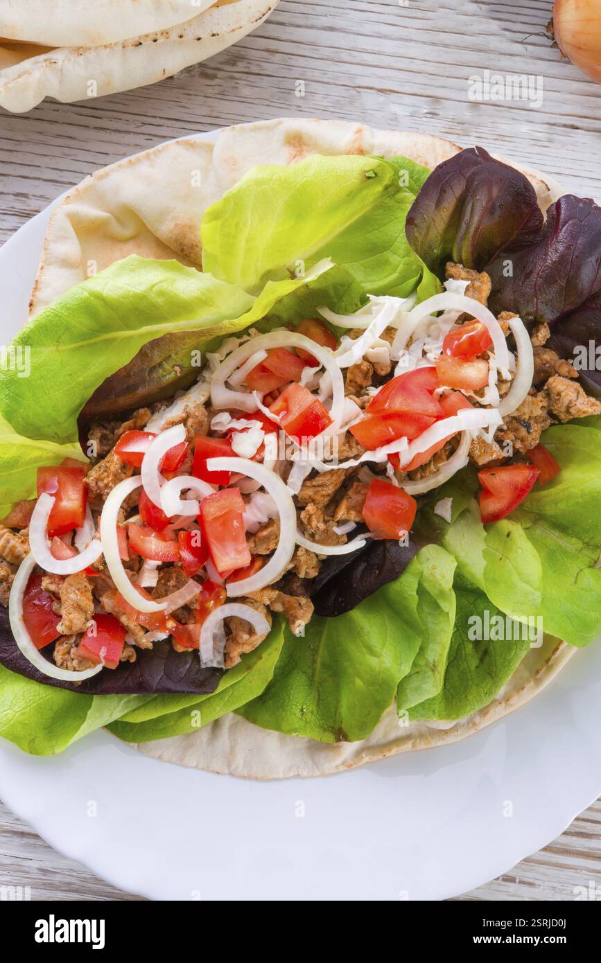 Kebab - grilled meat, bread and vegetables Stock Photo - Alamy