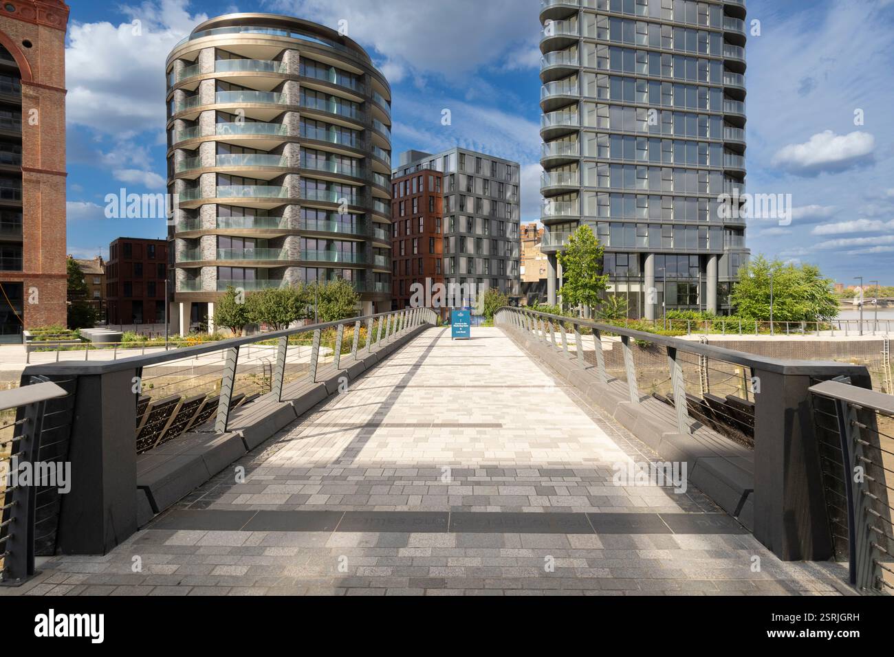 New residential high-rises at Chelsea Waterfront. Pedestrian bridge ...