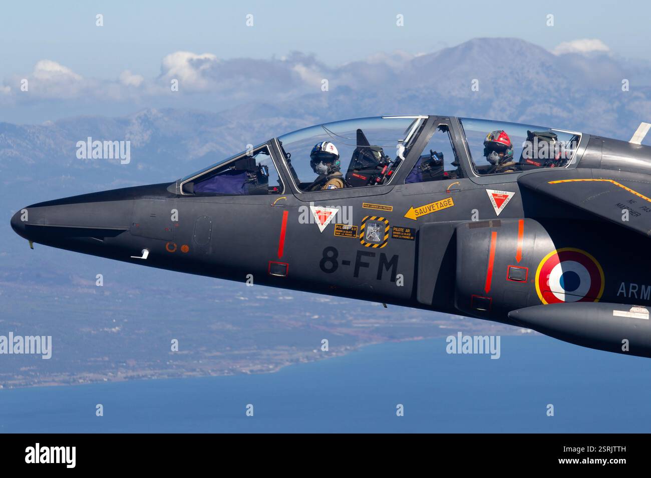 A French Air Force Alpha Jet in flight, a light attack aircraft with a ...