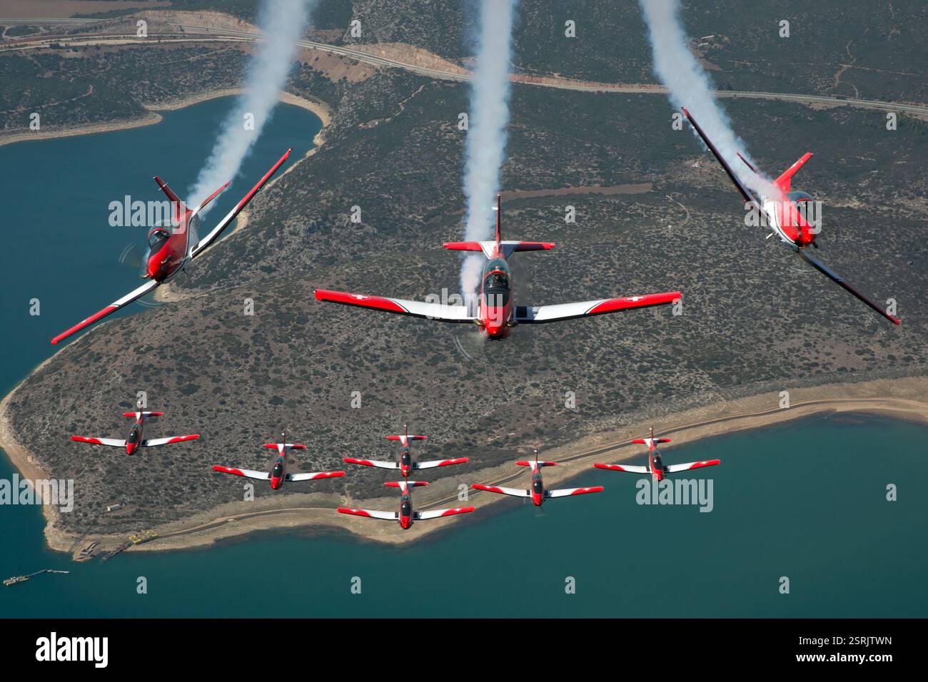 Swiss Air Force PC-7 Team in formation flight, showcasing the ...