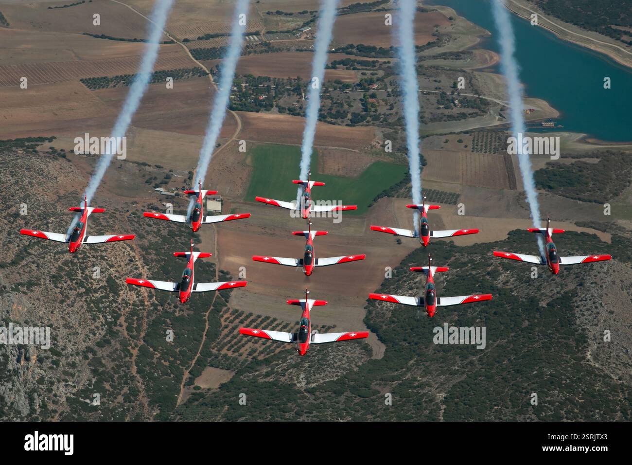 Swiss Air Force PC-7 Team in formation flight, showcasing the ...