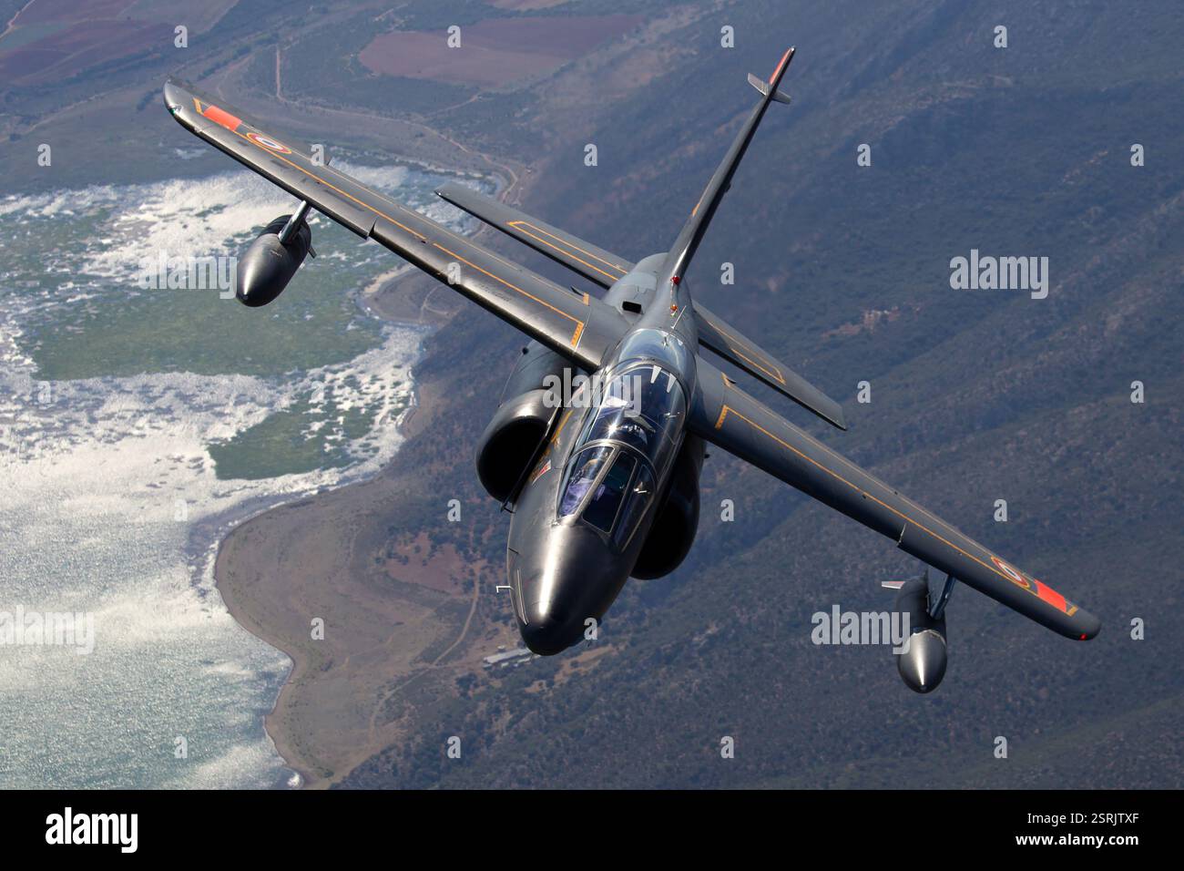 French Air Force Alpha Jet E executing a precision maneuver, equipped ...