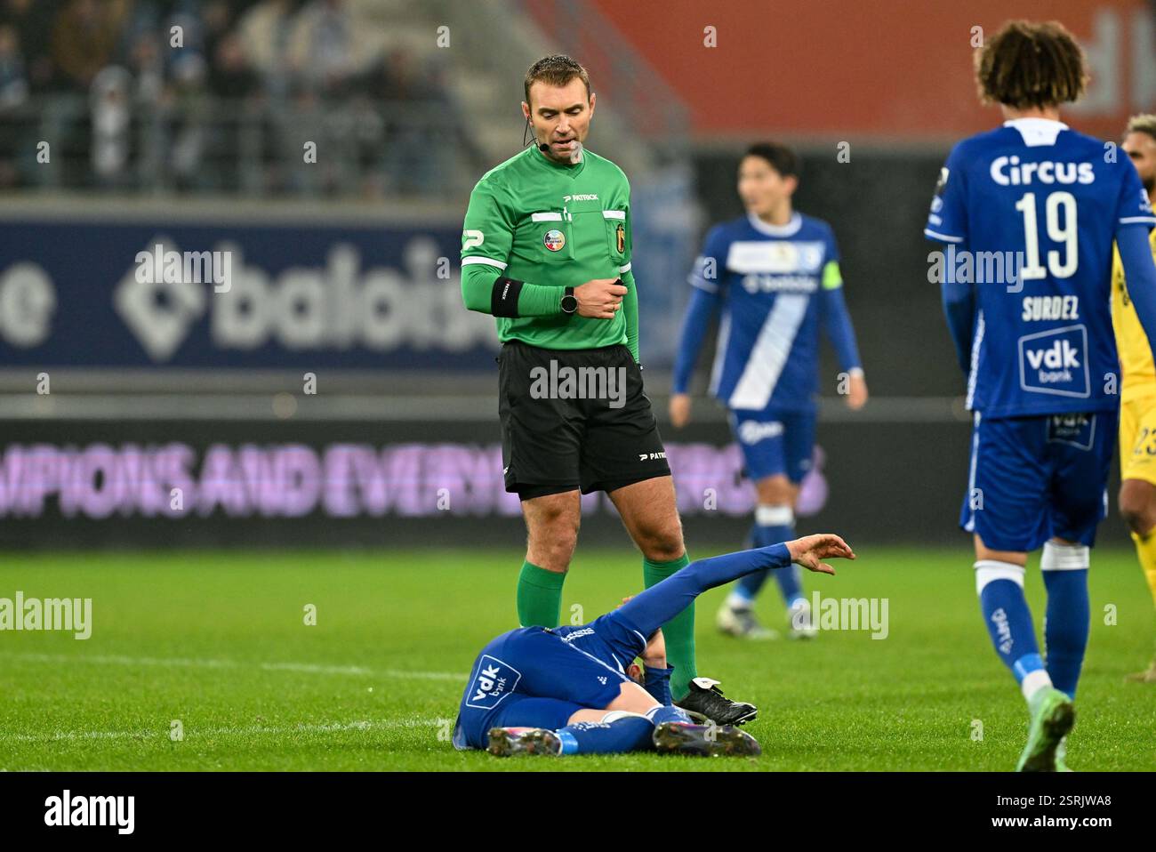 Gent, Belgium. 26th Dec, 2024. referee Nicolas Laforge checks on Max ...