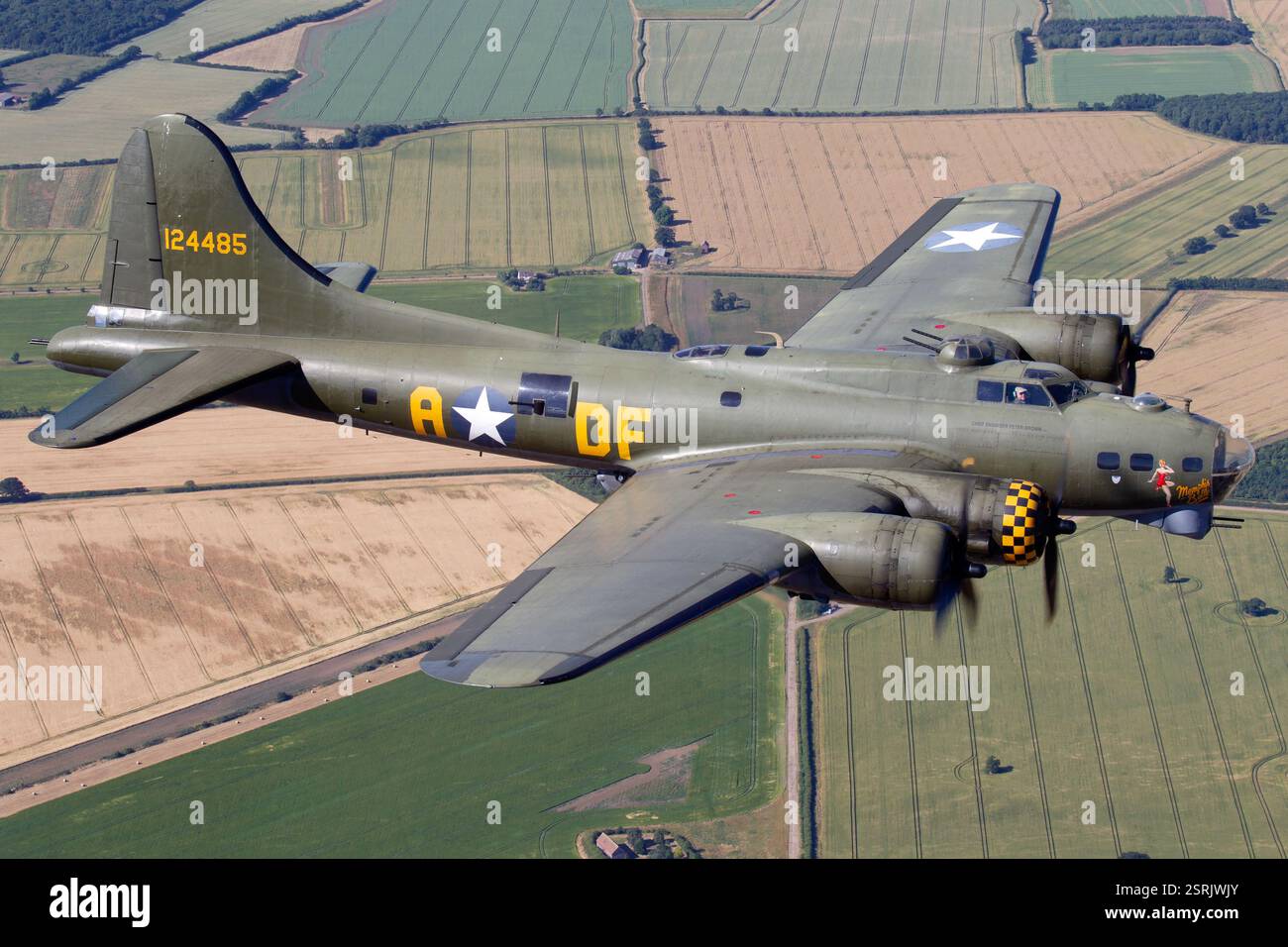 B-17 Sally B, a WWII-era Boeing Flying Fortress, equipped with 4 Wright ...