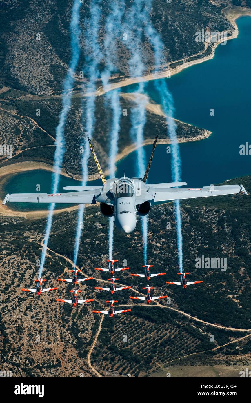 Swiss Air Force F/A-18 Hornet and PC-7 Team performing joint aerobatic ...