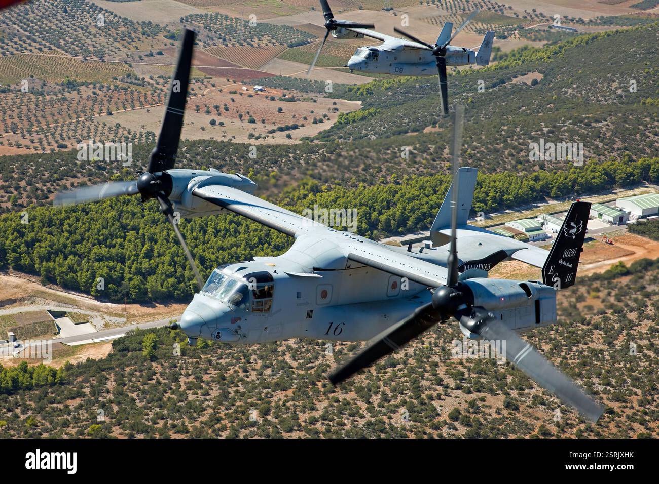 Marines OV-22 Osprey conducting aerial operations. Versatile tilt-rotor ...