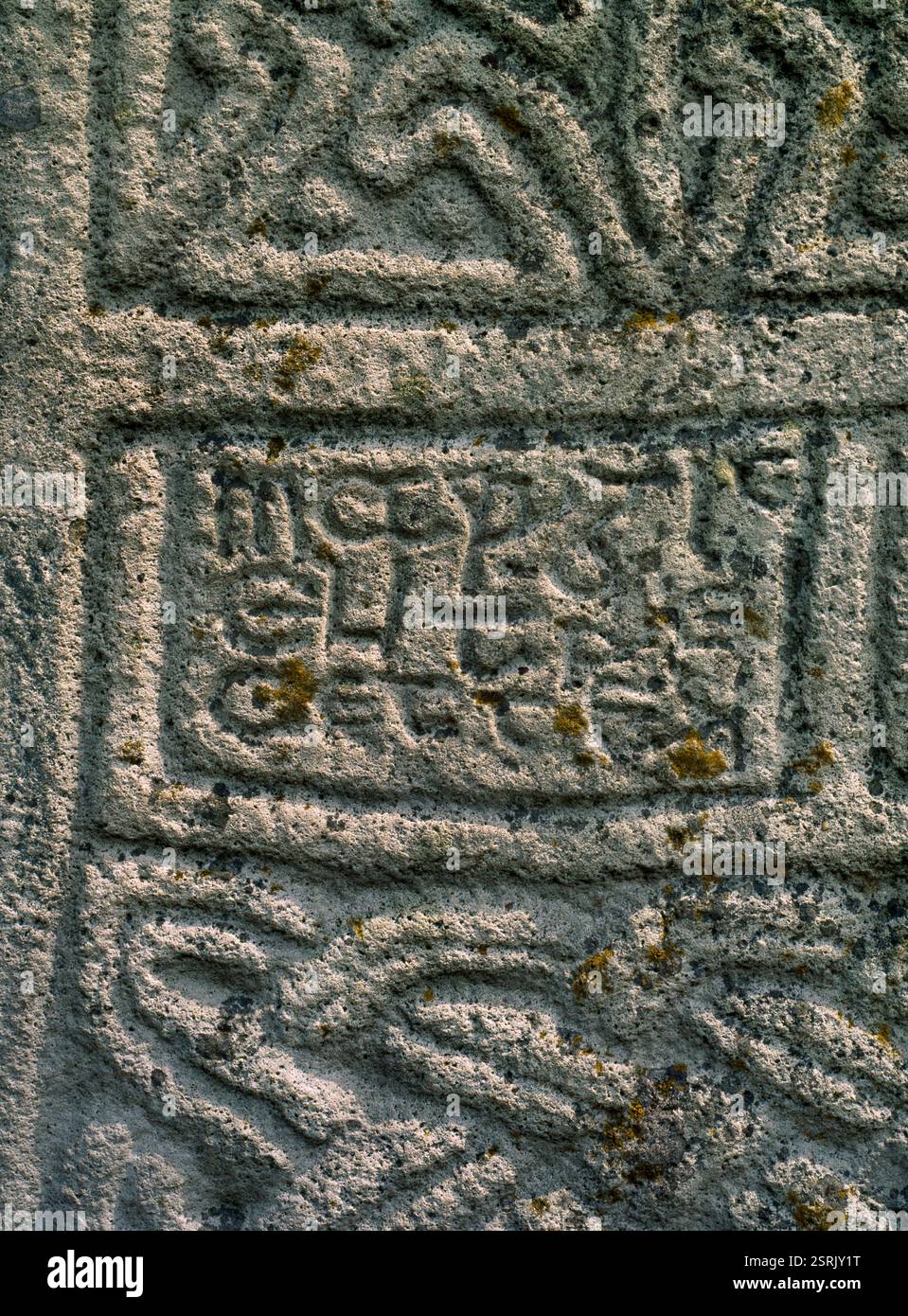 Detail of diagonal key patterns, interlace & inscription on the W face ...