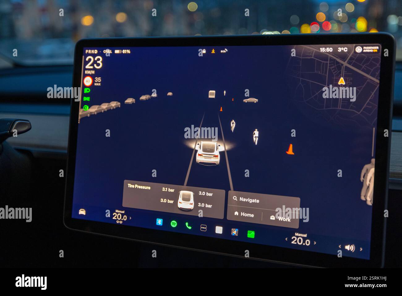 Close up view of Tesla autopilot screen displaying navigation and road ...