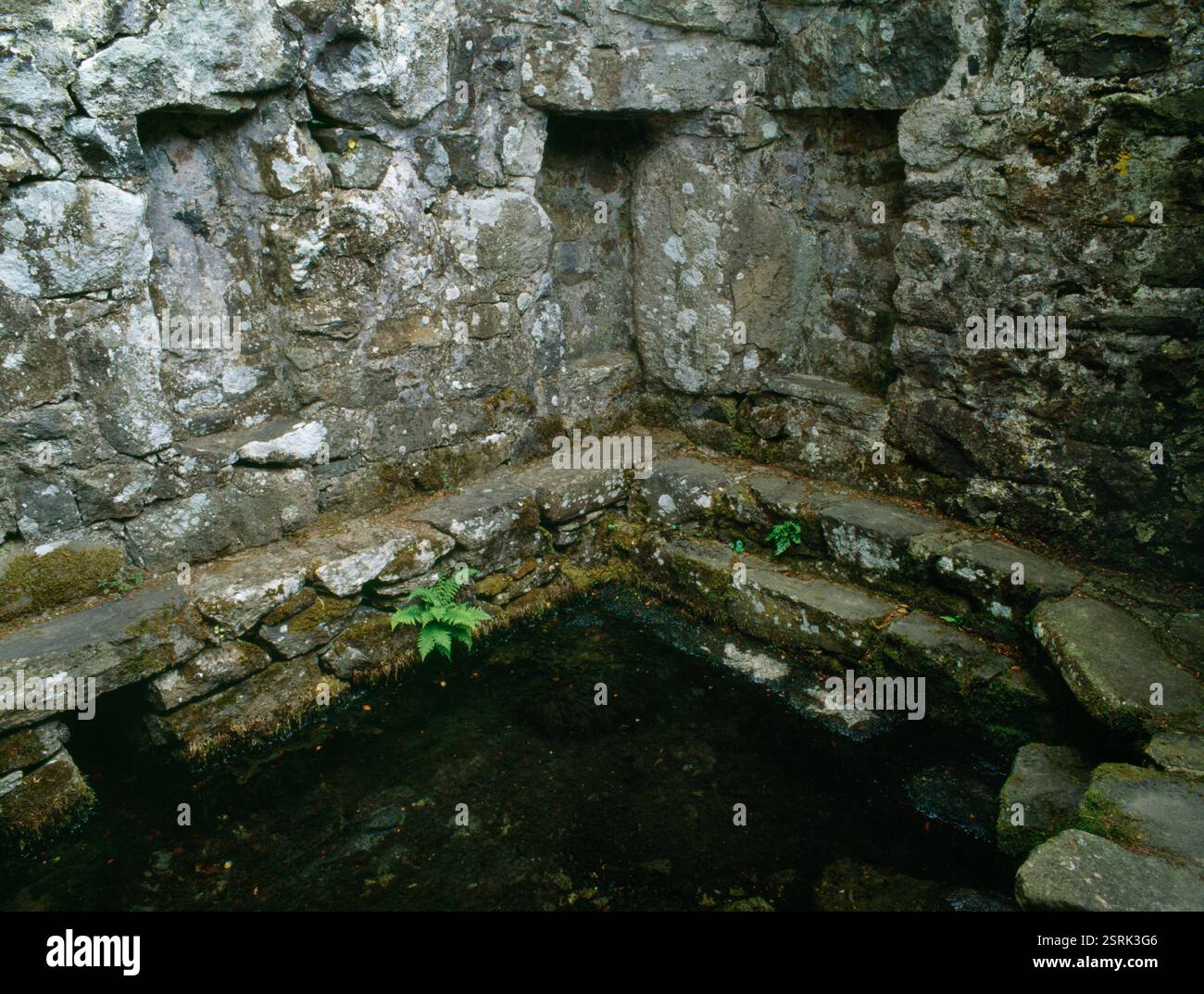 View NE inside the main enclosed well chamber at St Cybi's Well ...