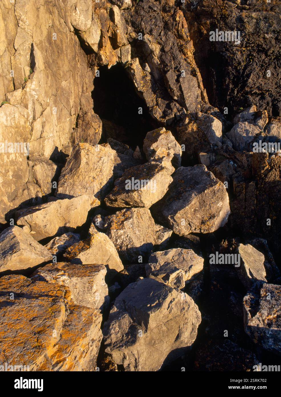 View SE of the entrance to St Patrick's Cave, Llanbadrig, Anglesey ...