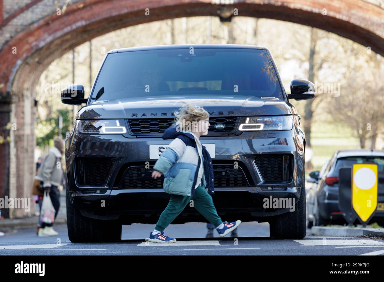 Danger to children from sports utility vehicles Stock Photo - Alamy