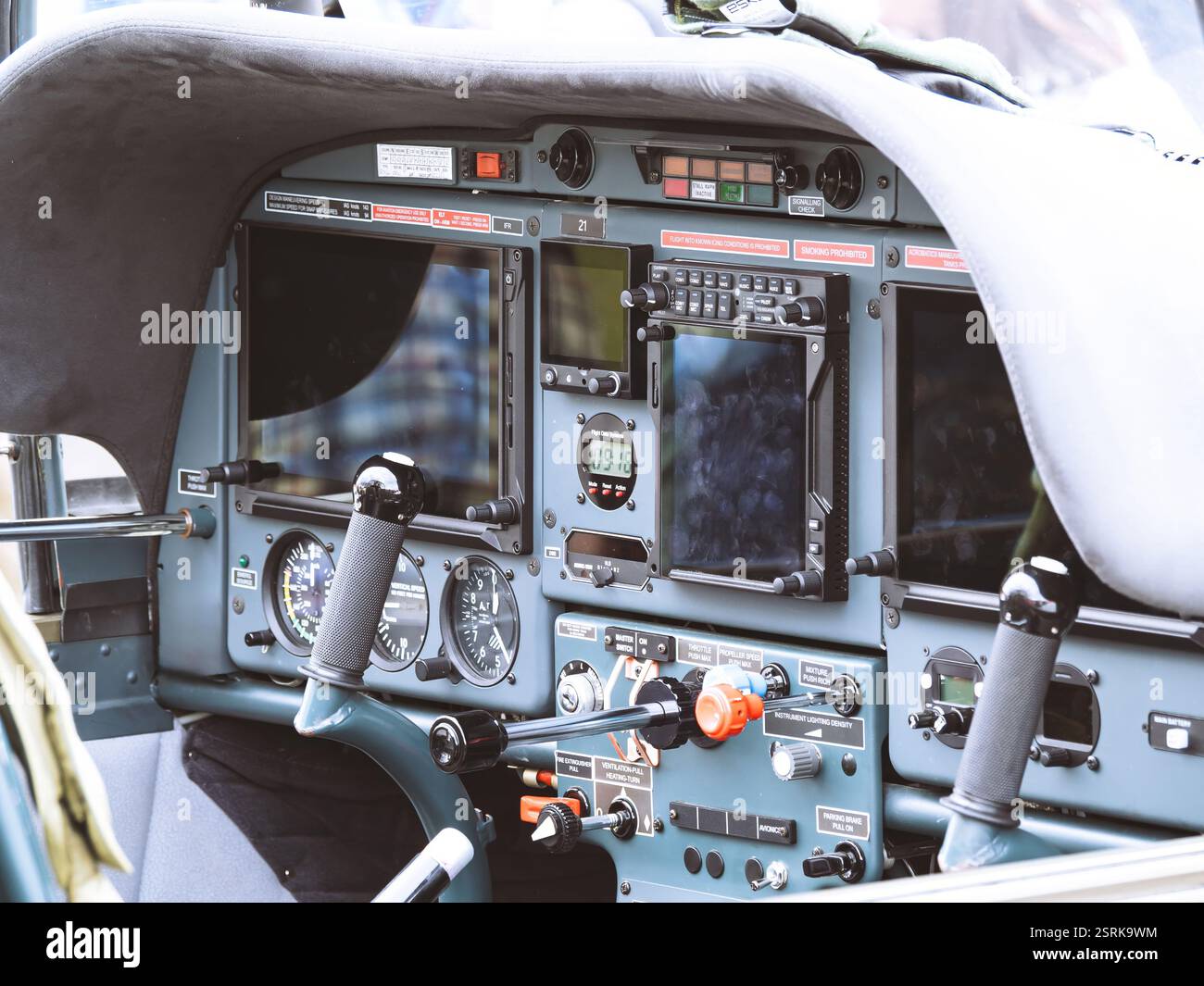 Close-up view of a light aircraft cockpit showcasing flight control ...