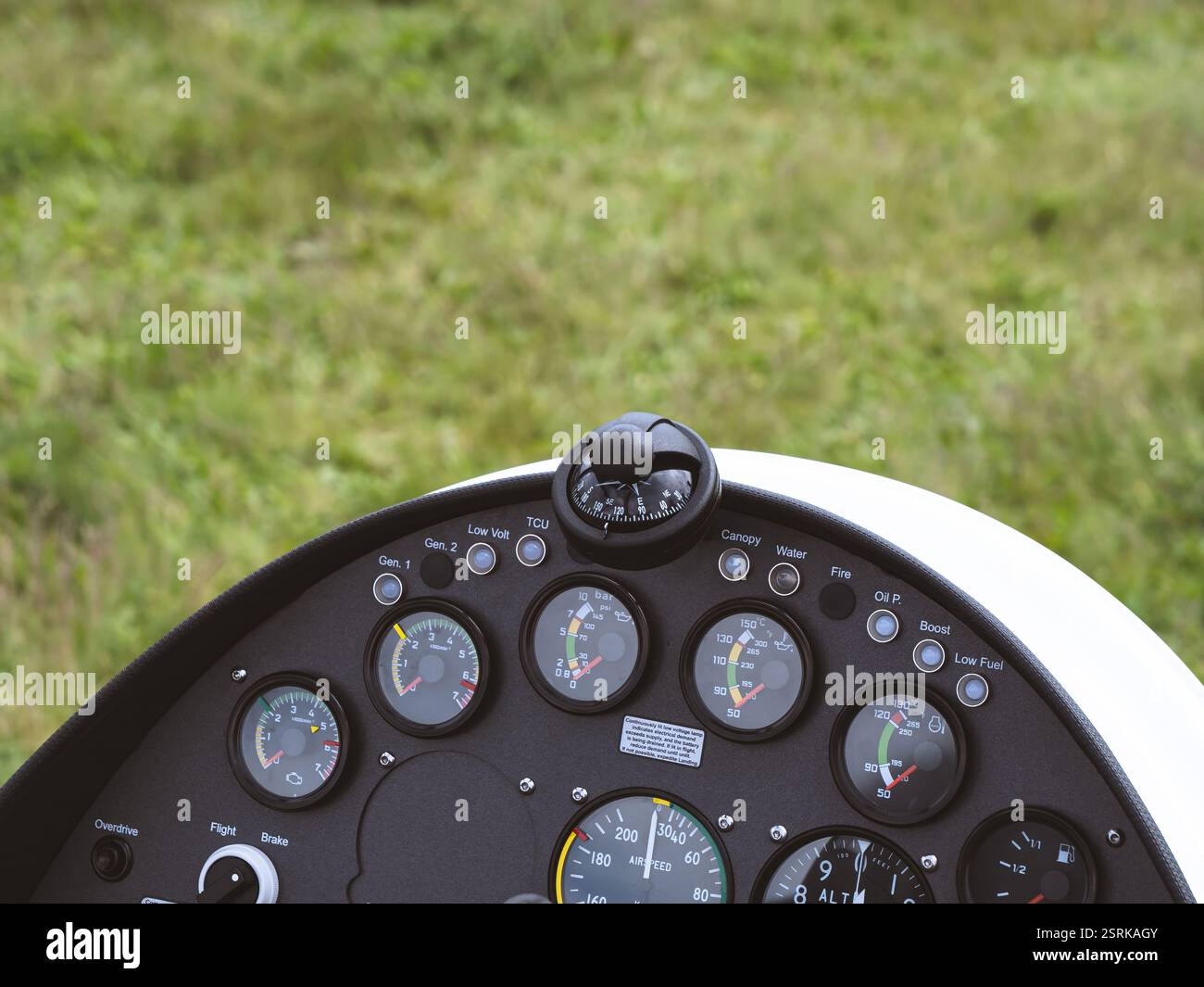 Close-up of a glider cockpit showing flight instruments, control stick ...