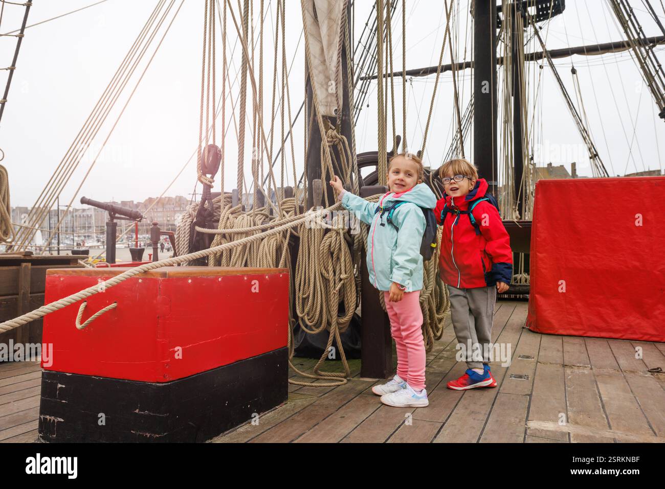 Kids exploring a ship deck amidst ropes and masts in Saint-Malo Stock ...