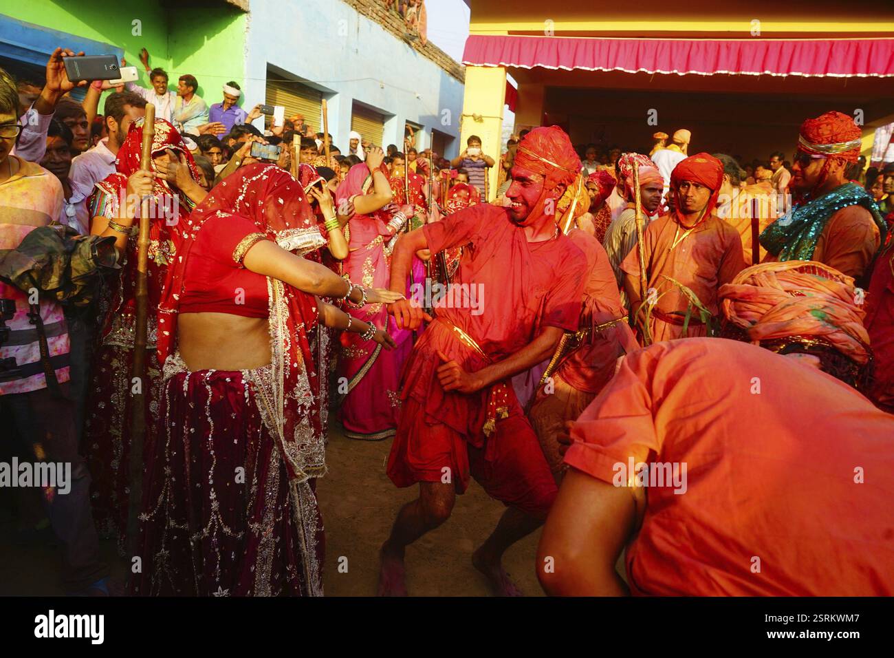 Men dancing, Lathmar Holi festival, Mathura, Uttar Pradesh, India, Asia ...