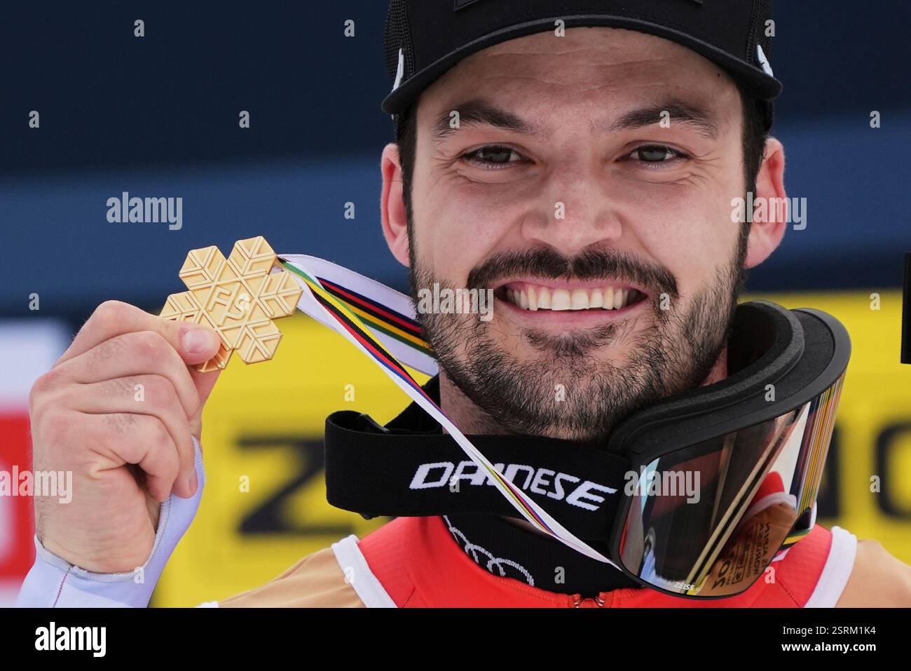 Switzerland's Loic Meillard shows his gold medal for a men's slalom, at ...