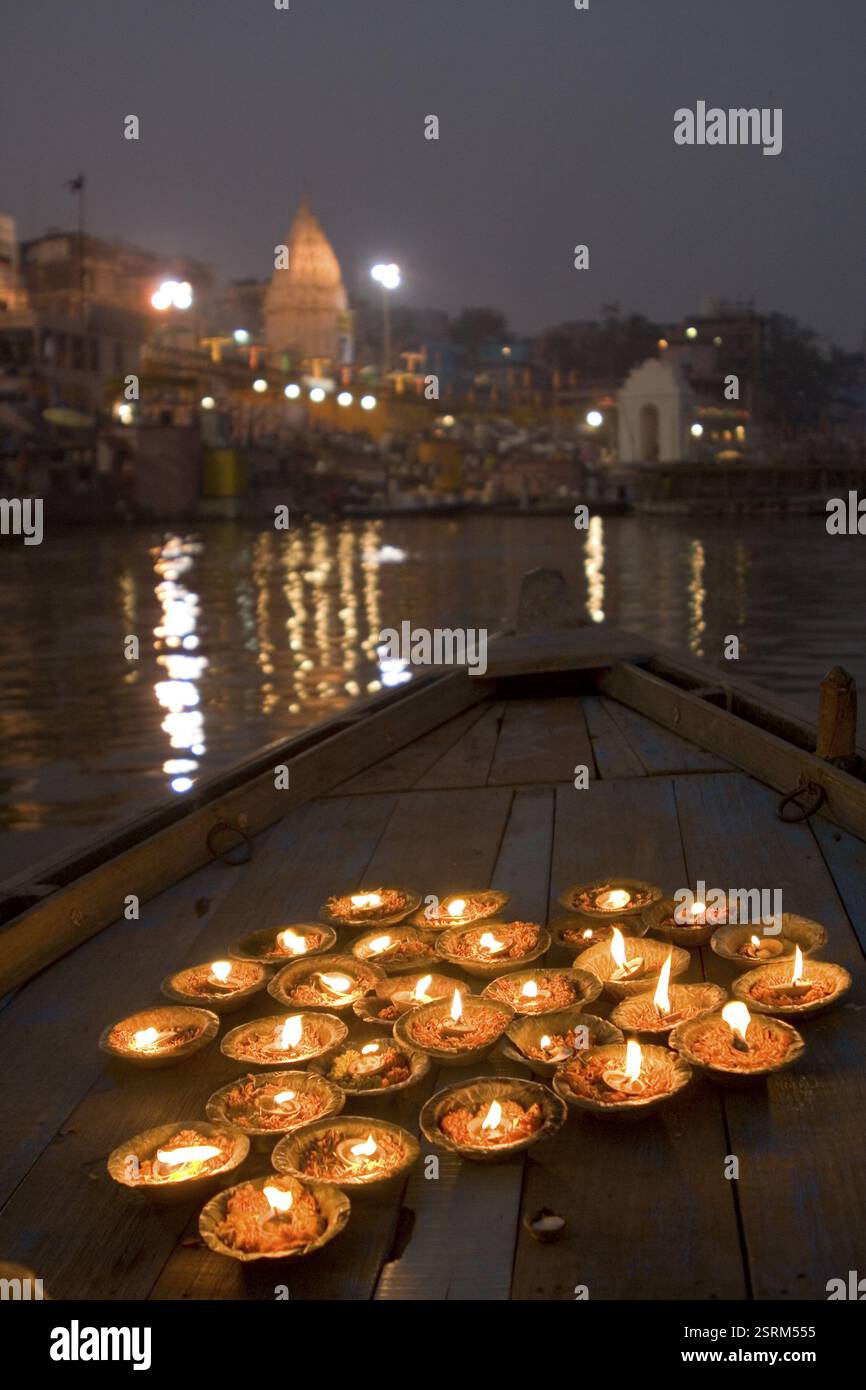 Diyas on boat in river for dev diwali festival, Varanasi, Uttar Pradesh ...