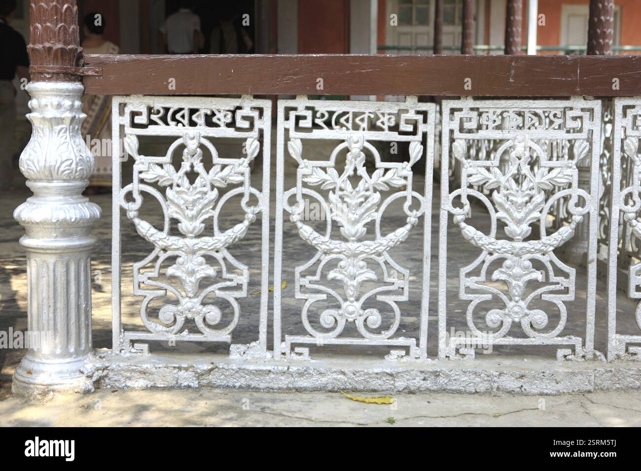 Cast iron grilles and pillars at vaishnavite hindu temple, Kamalabari ...