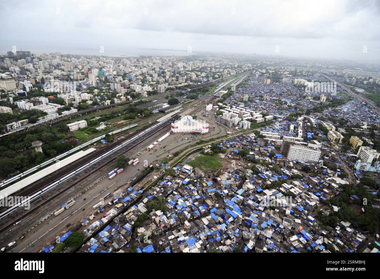 Aerial view of bandra terminus behrampada slum and bandra khar skyline, Bombay Mumbai ...