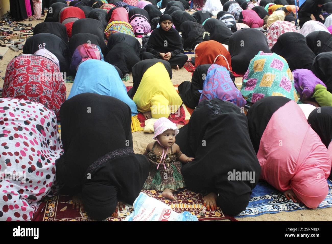 Muslim women offer prayer as they celebrate Eid al-Adha or festival of ...