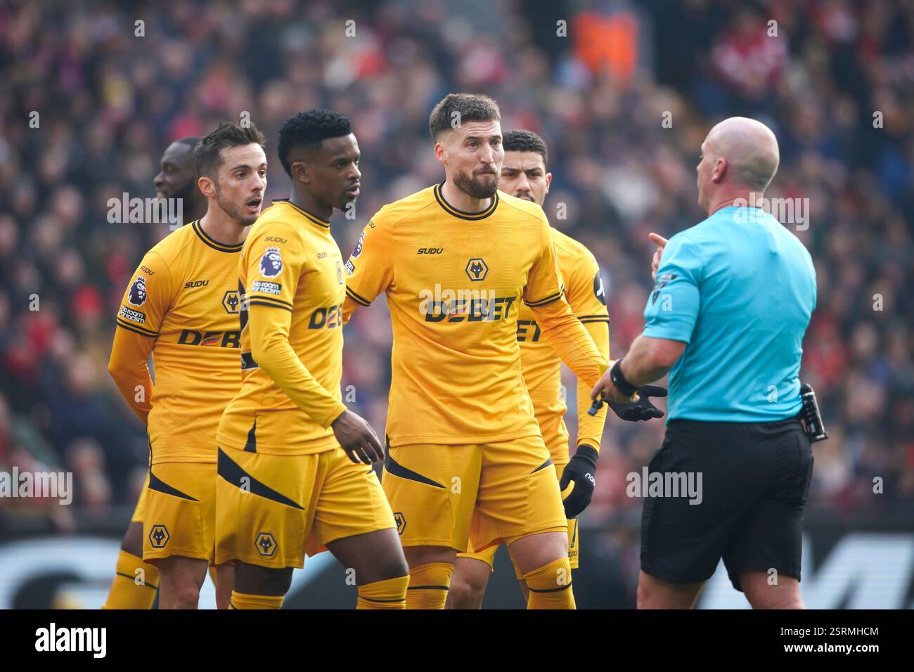 Wolverhampton Wanderers players argue with referee Simon Hooper during ...