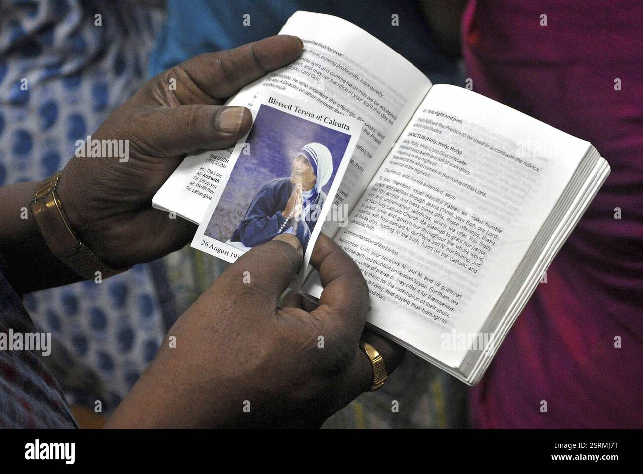 Roman Catholic priests Missionaries Charity devotees attend service ...