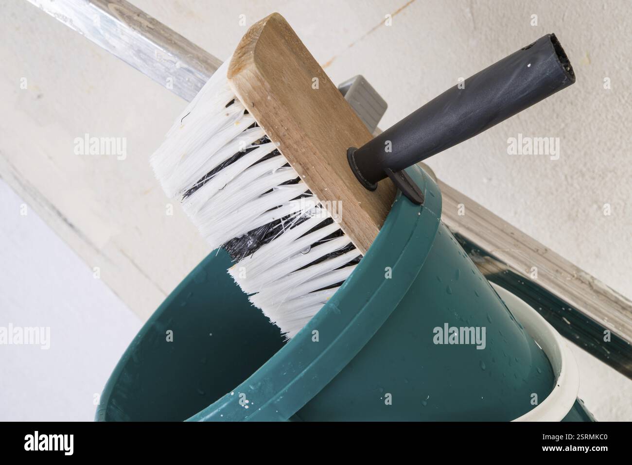 Leader with bucket Stock Photo - Alamy