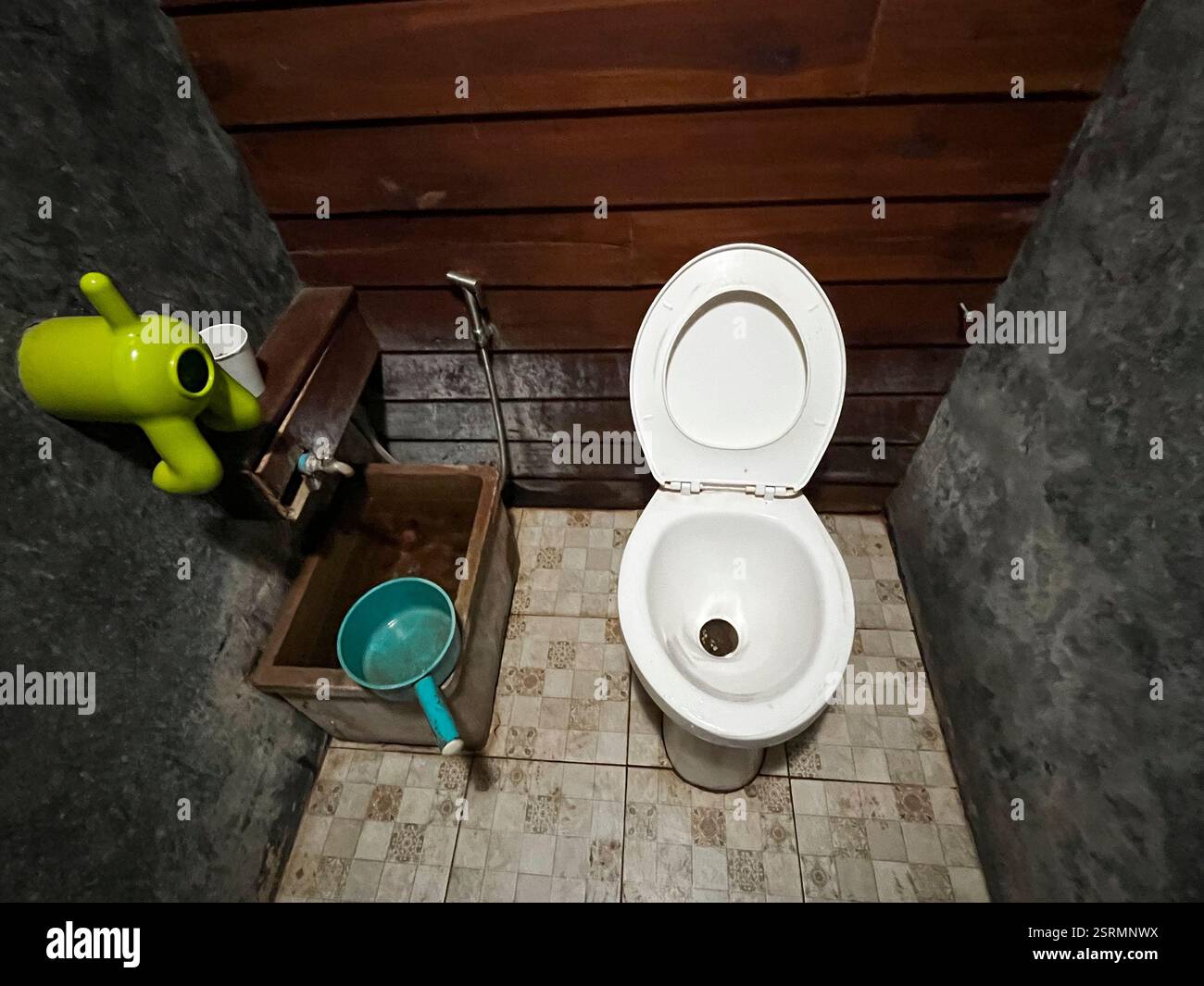 Very simple western style water toilet in rural Northern Thailand Stock ...