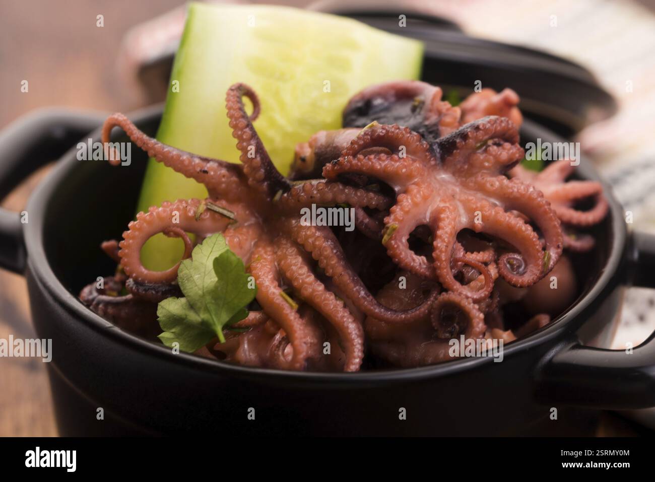 Octopus. Greek, eating Stock Photo - Alamy