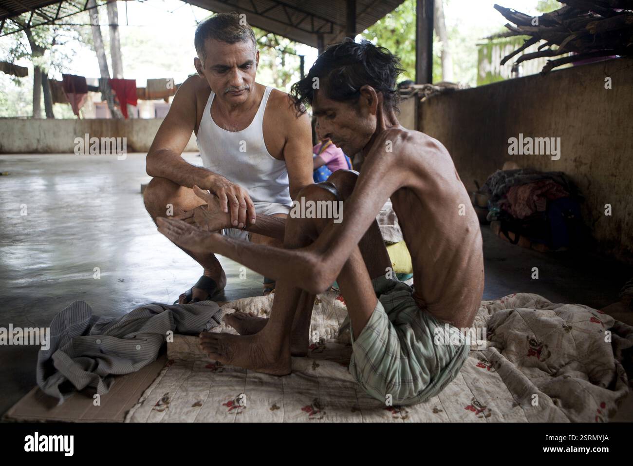 Dr prakash amte examines a patient, maharashtra, india, asia Stock ...