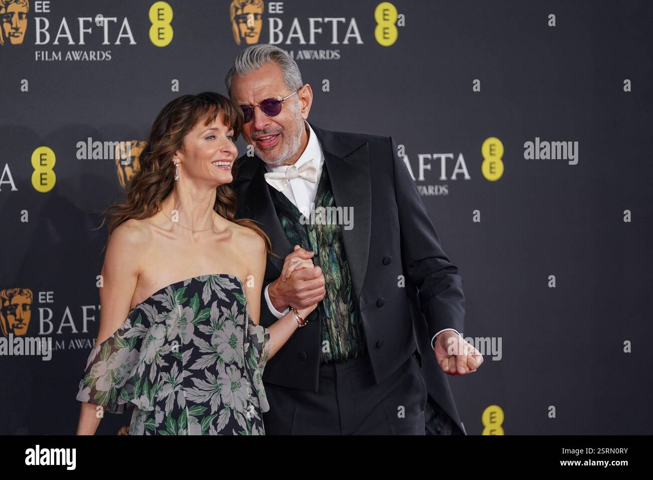 Emilie Livingston, left, and Jeff Goldblum pose for photographers upon ...