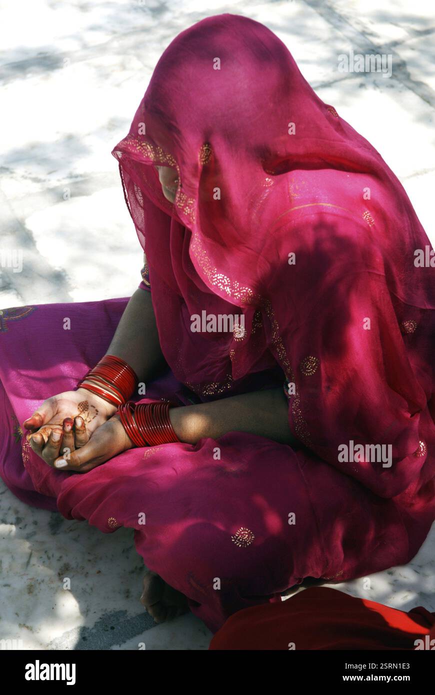 Rajasthani lady in veil doing prayer, Rajasthan, India, Asia Stock ...