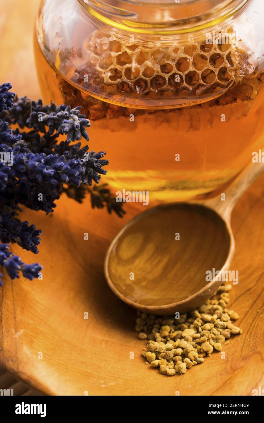 Lavender honey with bee pollen and honey comb Stock Photo - Alamy