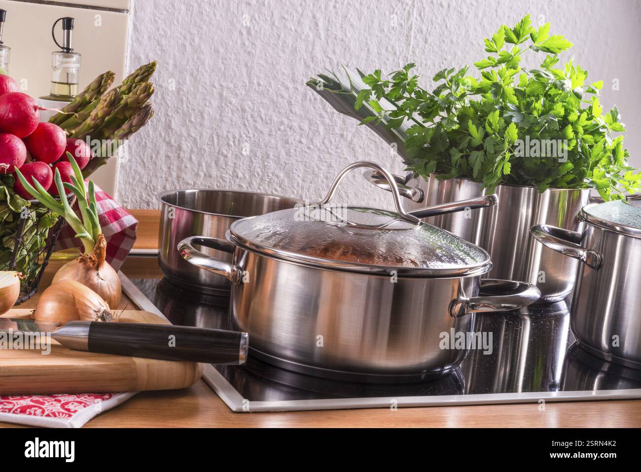 Cooking pots on the stove Stock Photo - Alamy