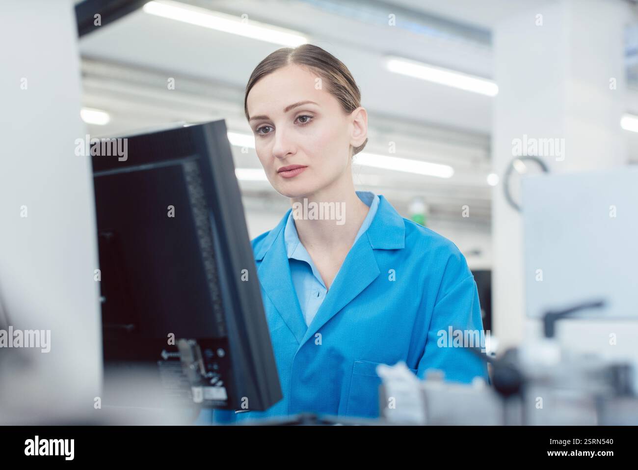 electrical engineer working in electronics manufacturing Stock Photo ...