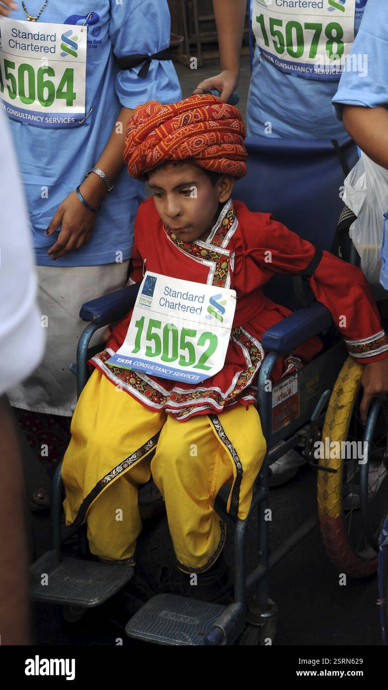 Disabled wheelchair participant boy in fancy dress in Marathon, Mumbai ...