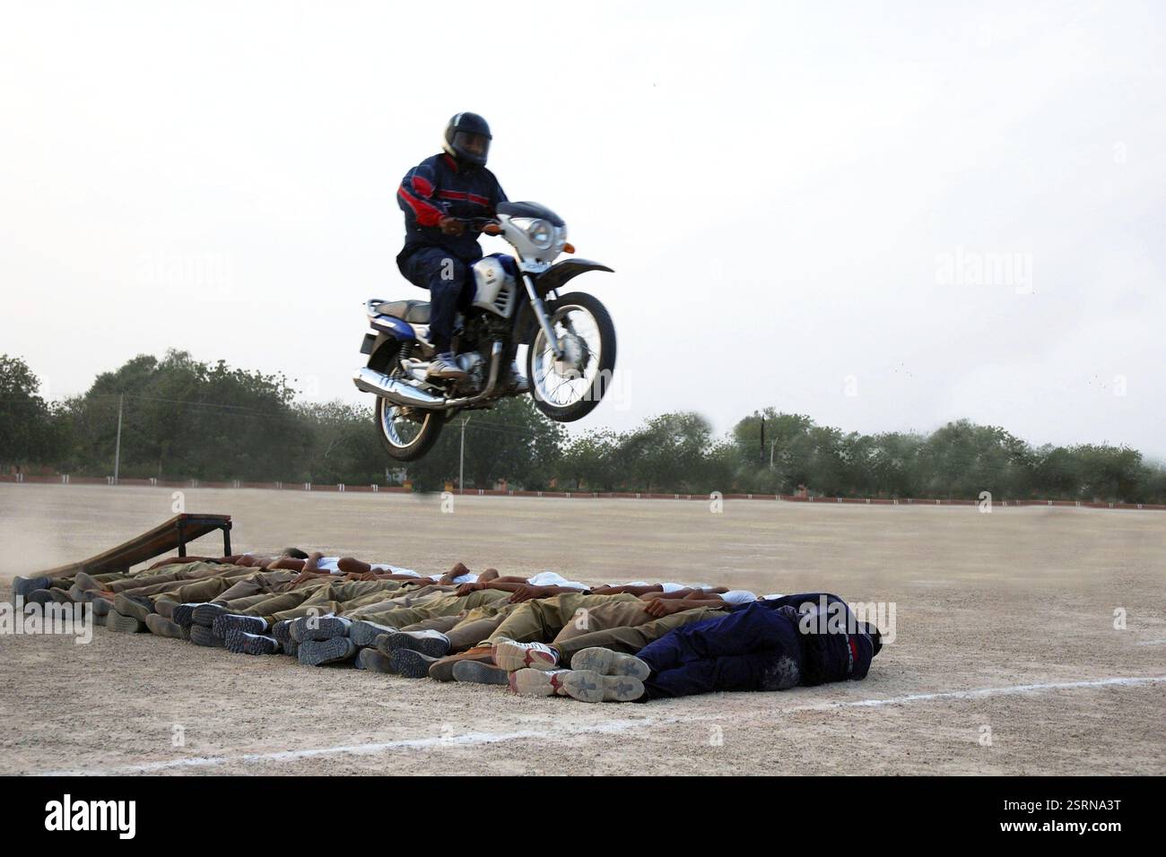 Policeman showing tricks on motorbikes, Jodhpur, Rajasthan, India, Asia ...