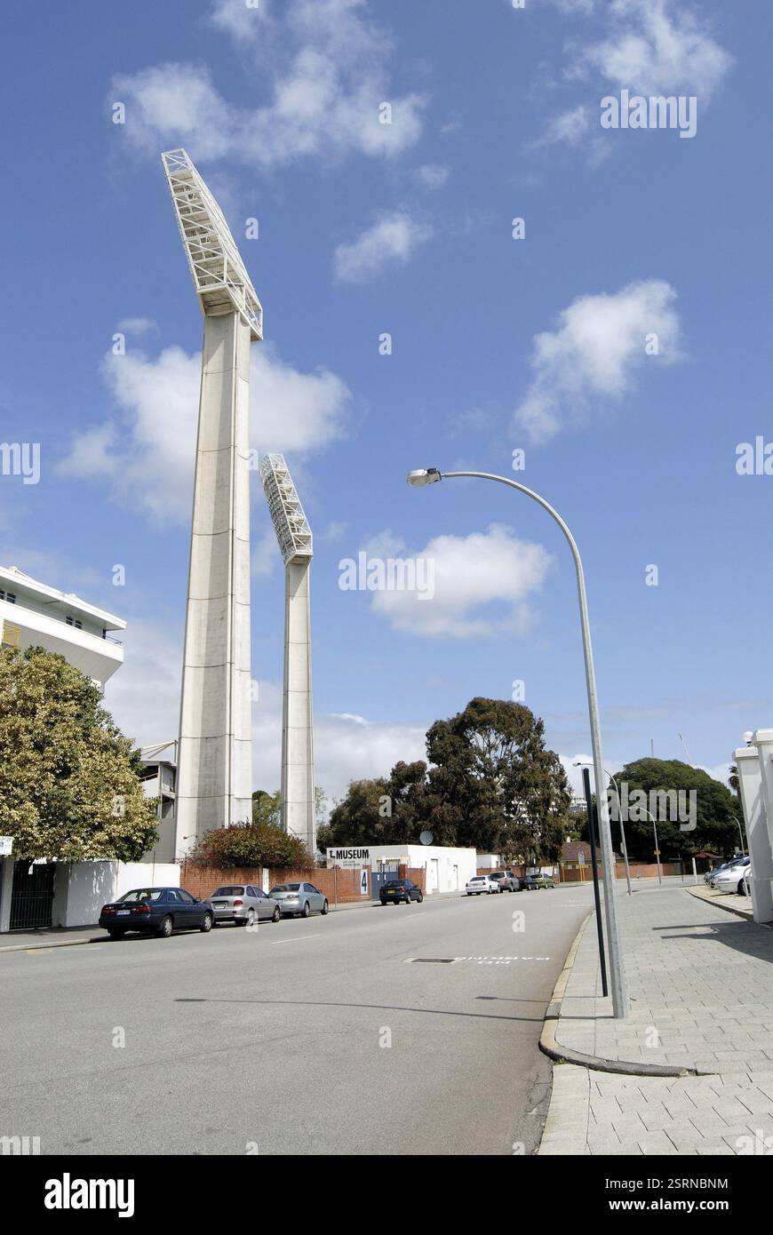 Contrast in lighting equipment outside WACA cricket ground, Perth ...